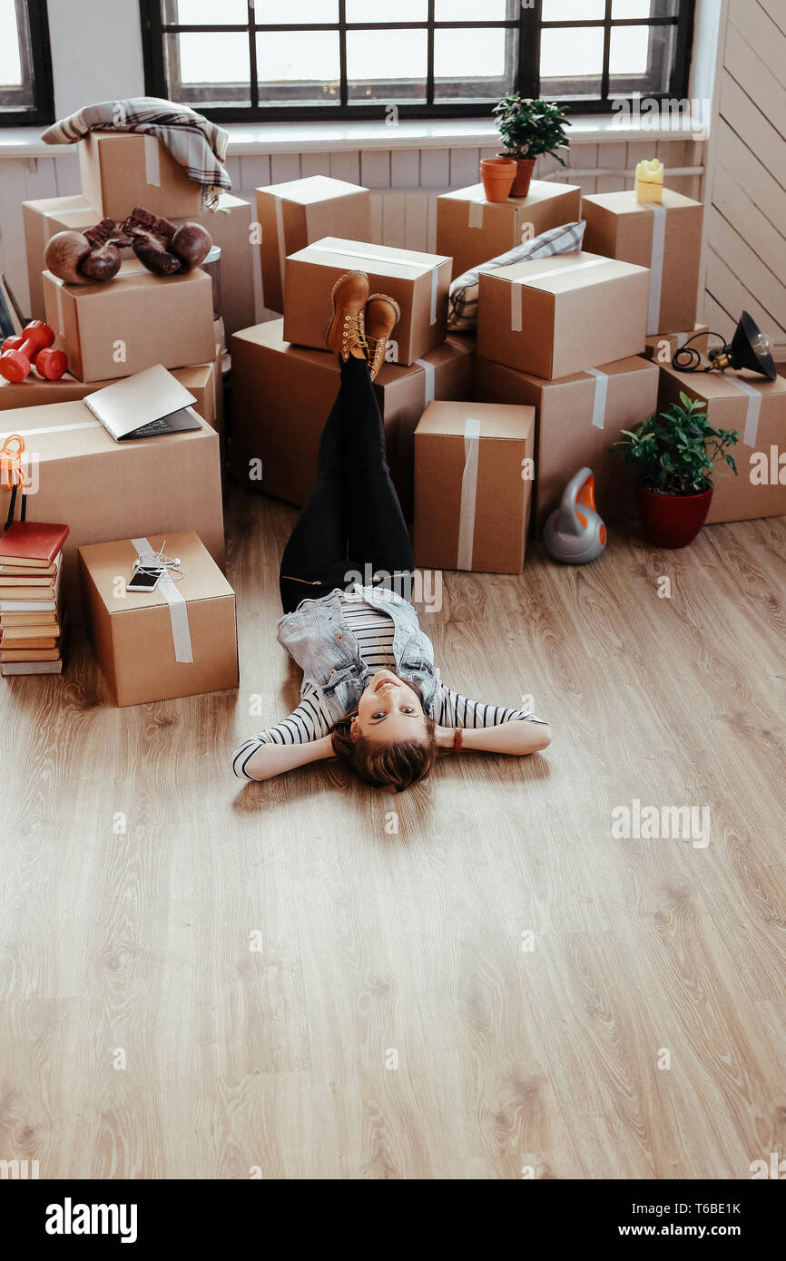Girl is moving to new home Stock Photo - Alamy