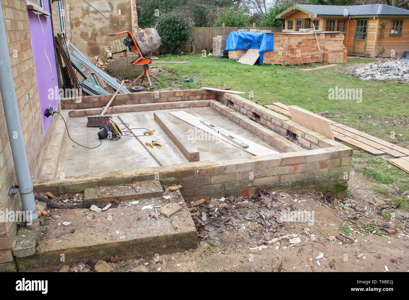 Demolition works in the residential property, destroyed garage, rubble ...