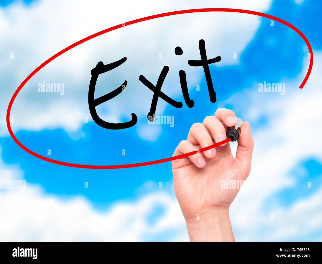 Man Hand writing Exit with black marker on visual screen Stock Photo ...
