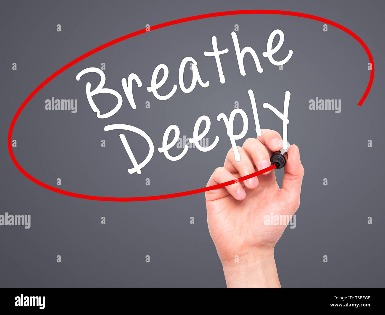 Man Hand writing Breathe Deeply with black marker on visual screen ...