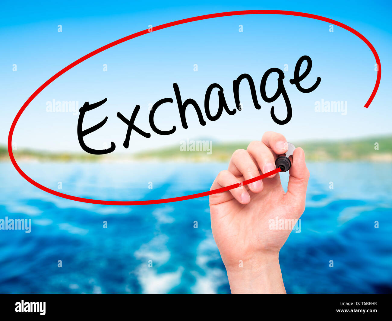 Man Hand writing Exchange with black marker on visual screen Stock ...