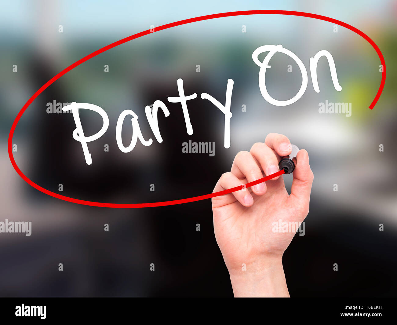 Man Hand writing Party On with black marker on visual screen Stock ...