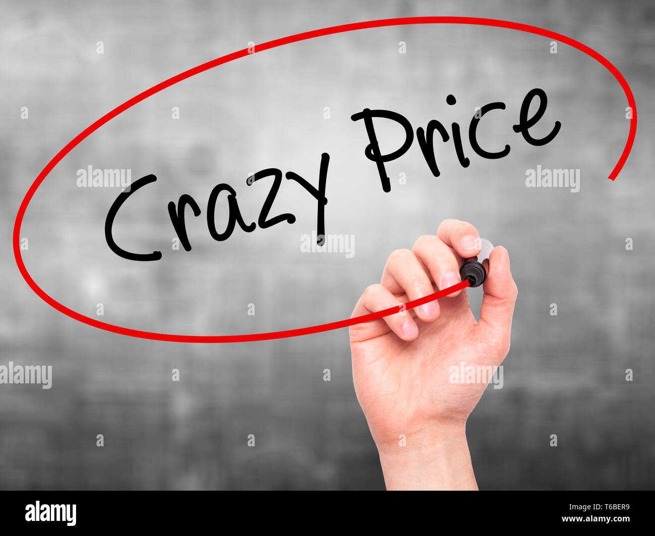 Man Hand writing Crazy Price with black marker on visual screen Stock ...