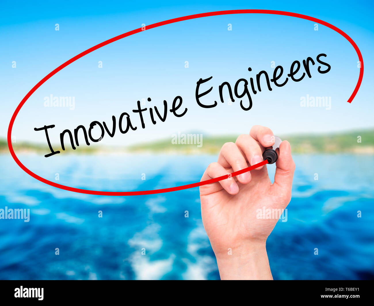 Man Hand writing Innovative Engineers with black marker on visual ...