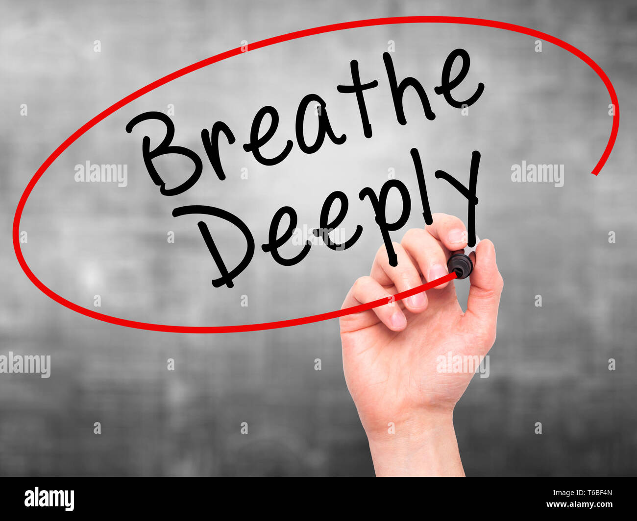 Man Hand writing Breathe Deeply with black marker on visual screen ...
