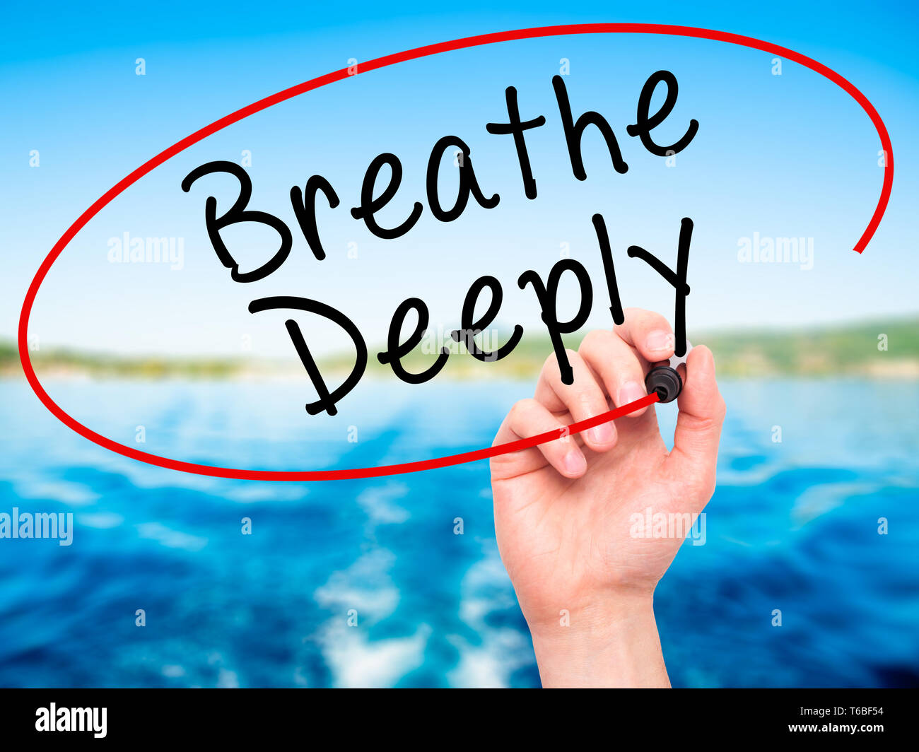 Man Hand writing Breathe Deeply with black marker on visual screen ...