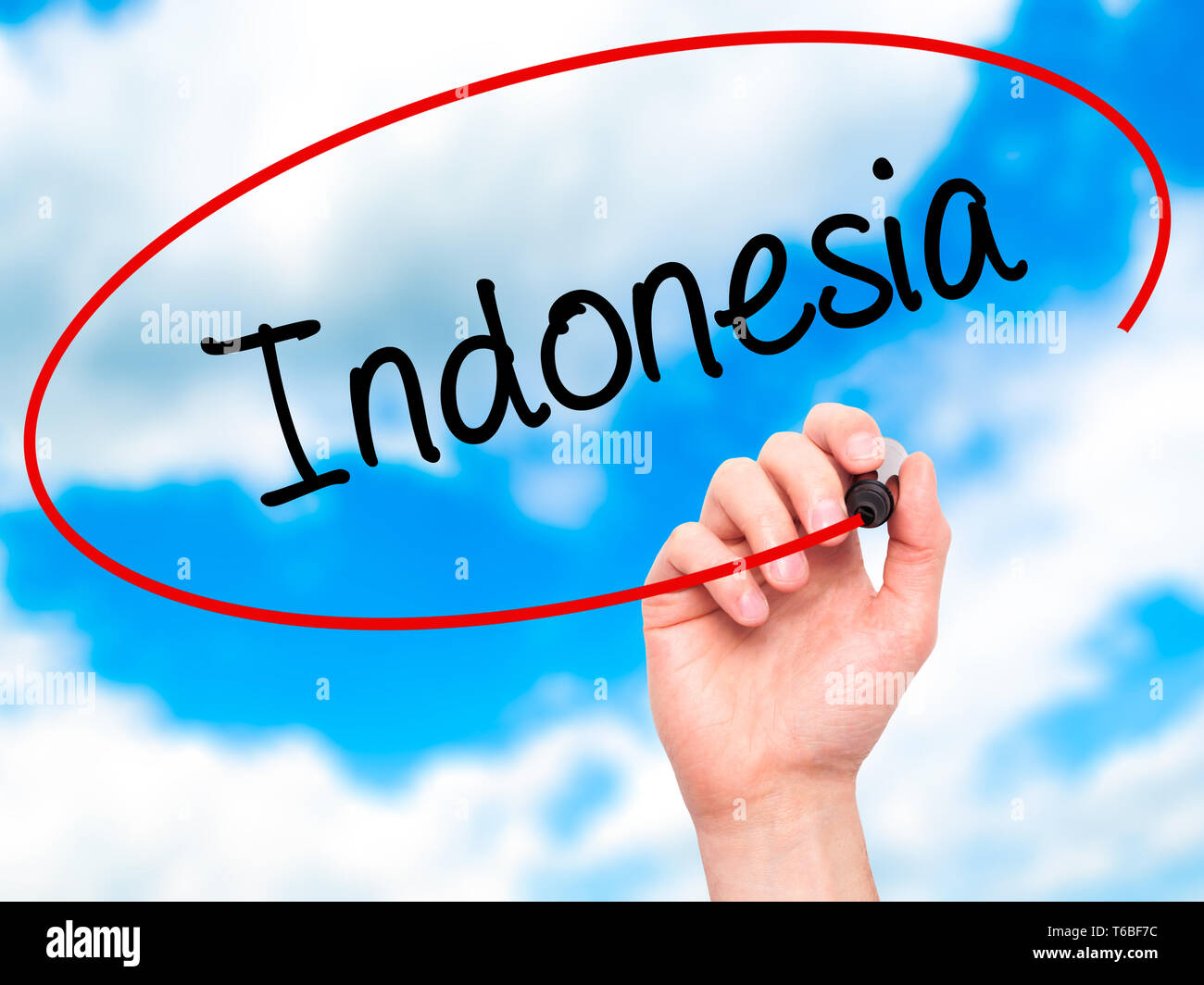 Man Hand writing Indonesia with black marker on visual screen Stock ...