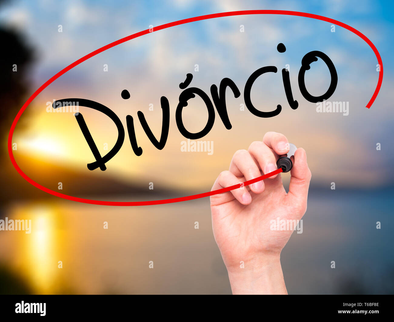Man Hand writing Divorcio (Divorce in Portuguese) with black marker on ...