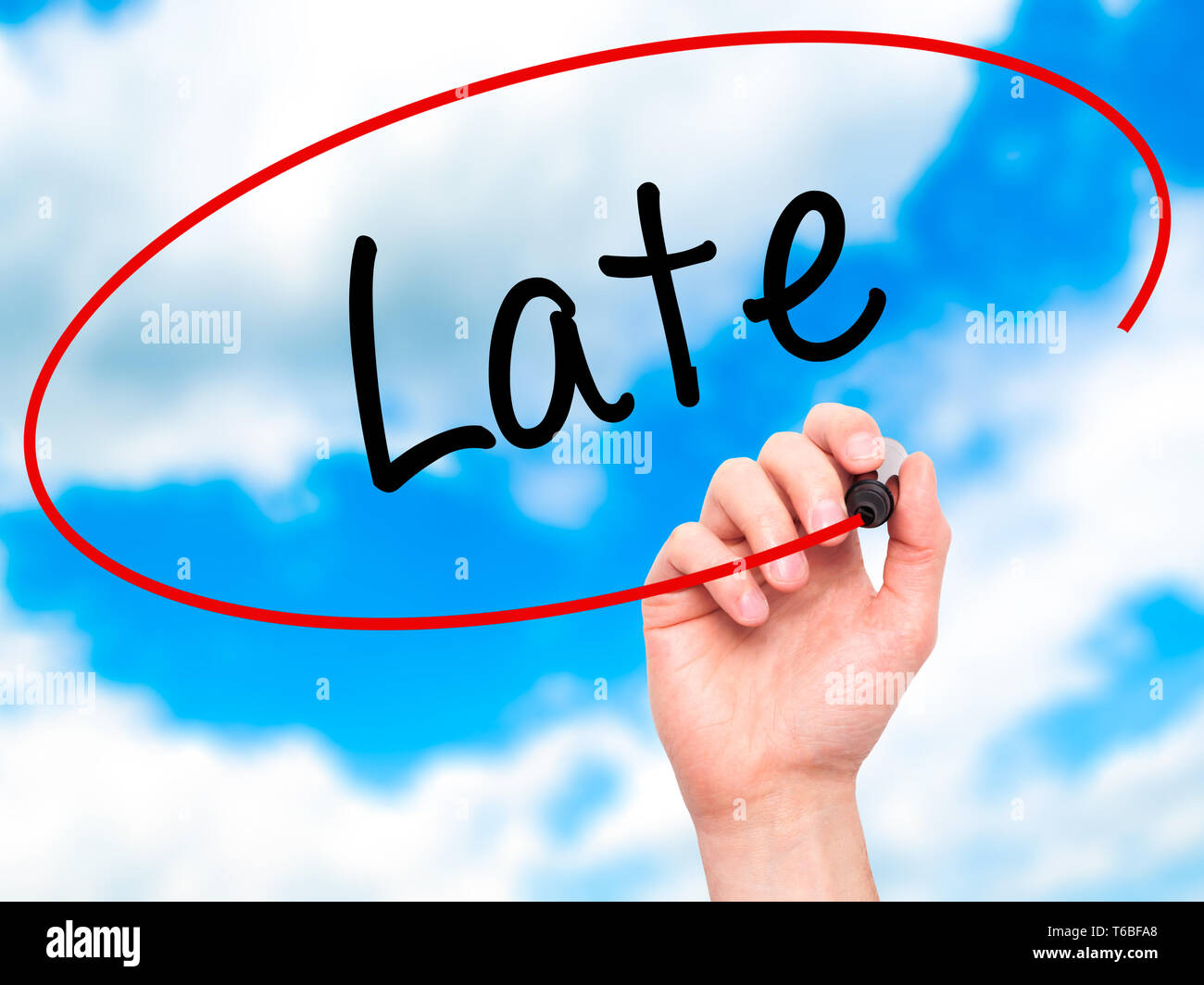 Man Hand writing Late with black marker on visual screen Stock Photo ...