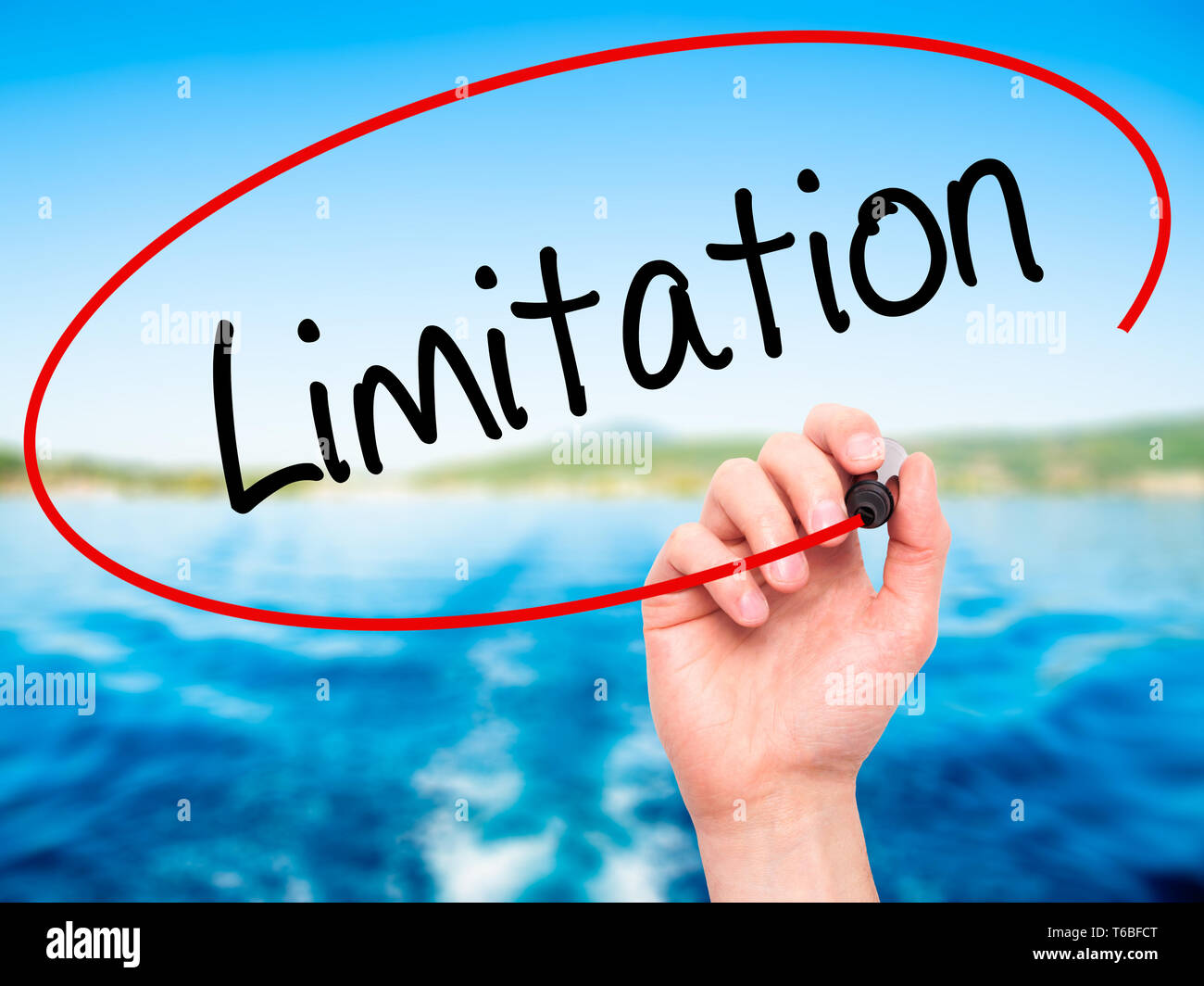 Man Hand writing Limitation with black marker on visual screen Stock ...