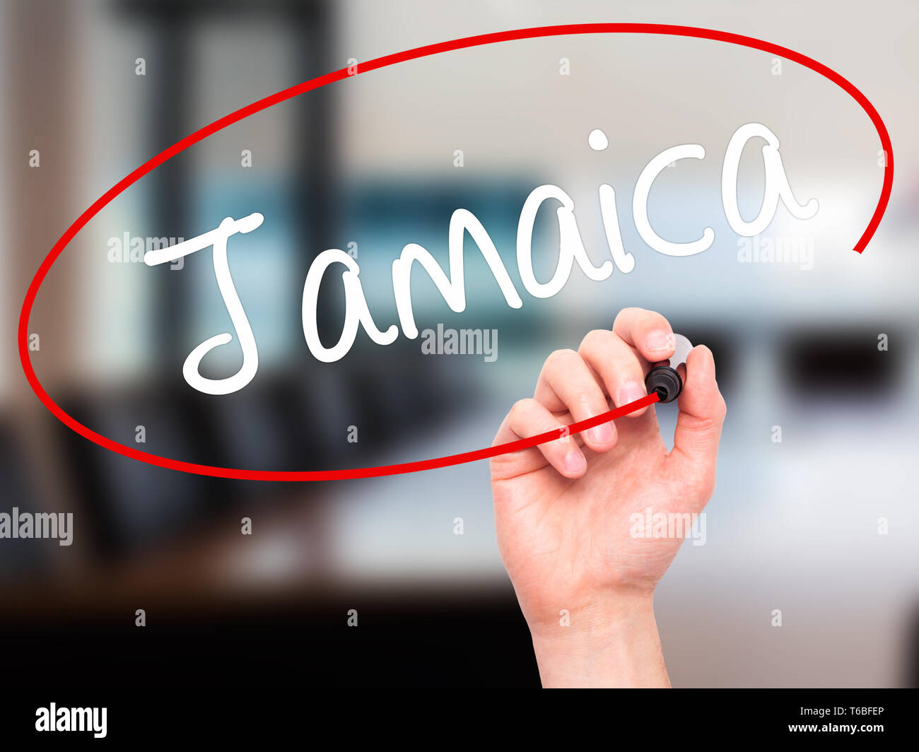 Man Hand writing Jamaica with black marker on visual screen Stock Photo ...