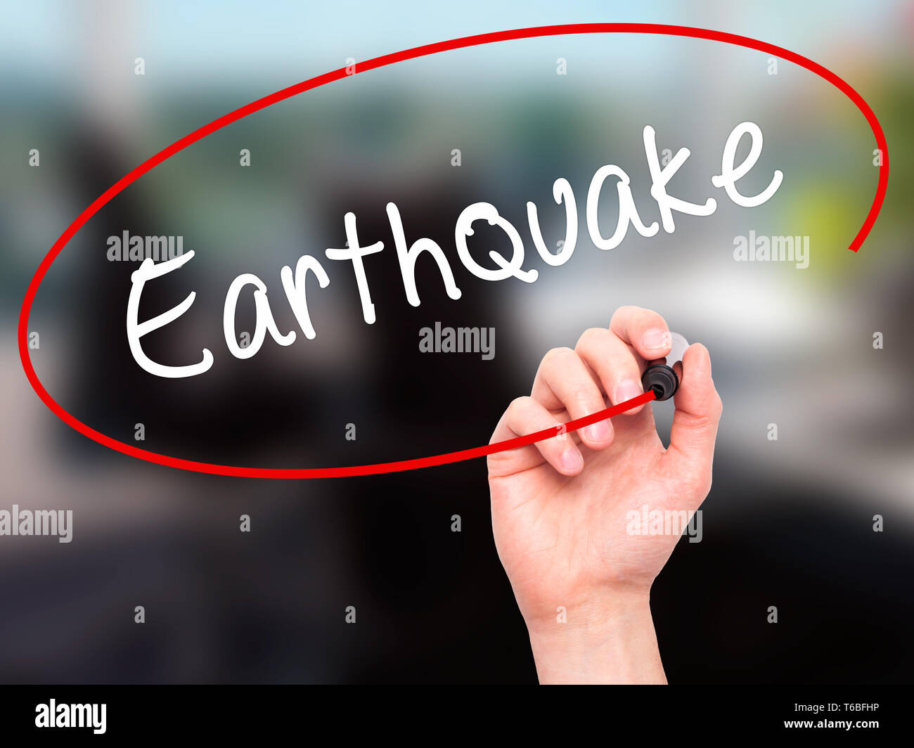 Man Hand writing Earthquake with black marker on visual screen Stock ...