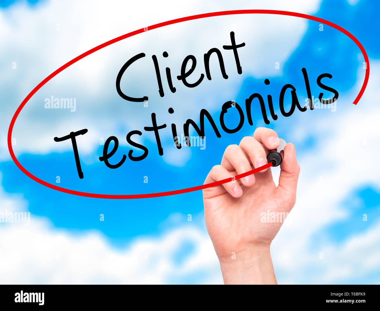 Man Hand writing Client Testimonials with black marker on visual screen ...
