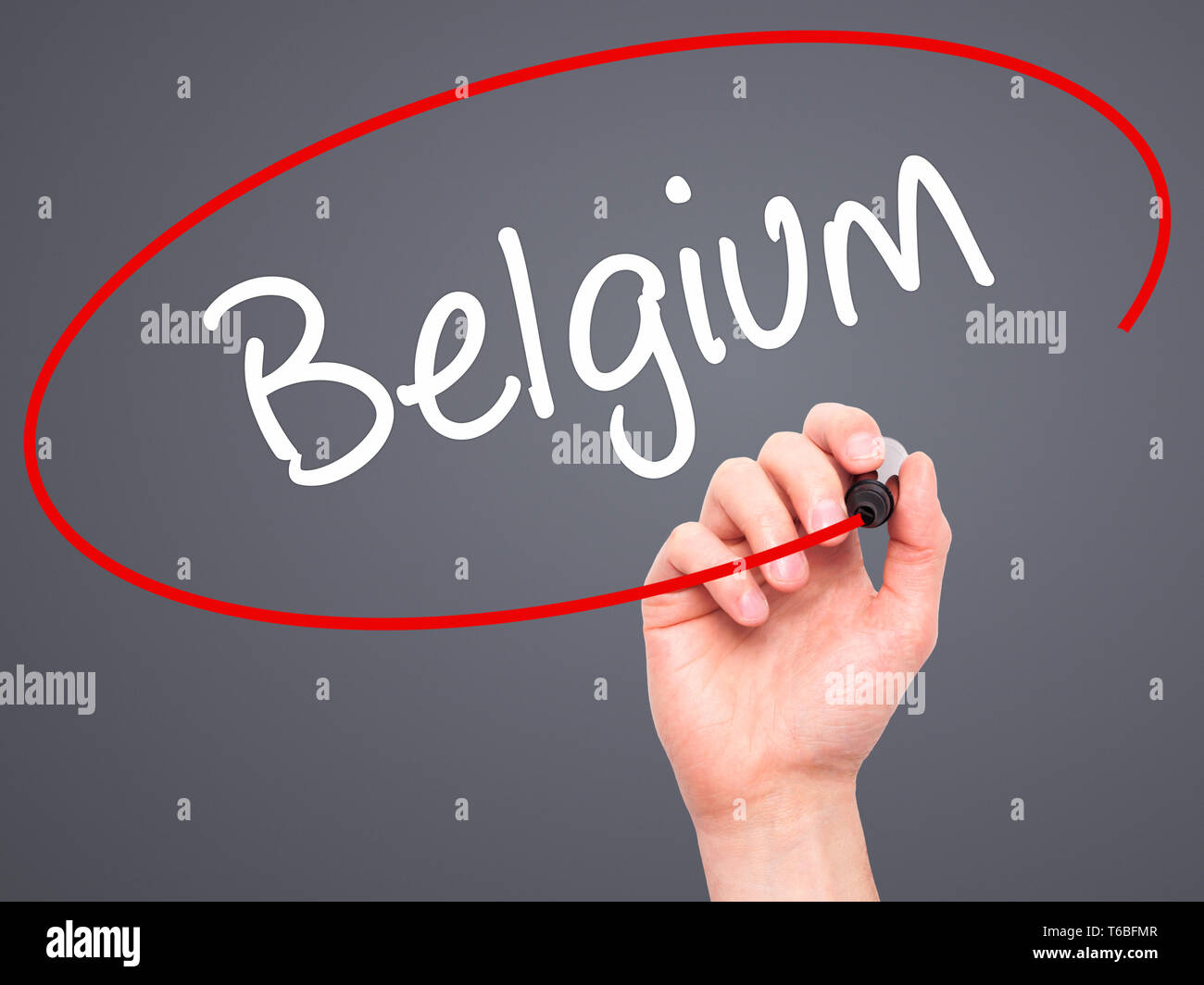 Man Hand writing Belgium with black marker on visual screen Stock Photo ...