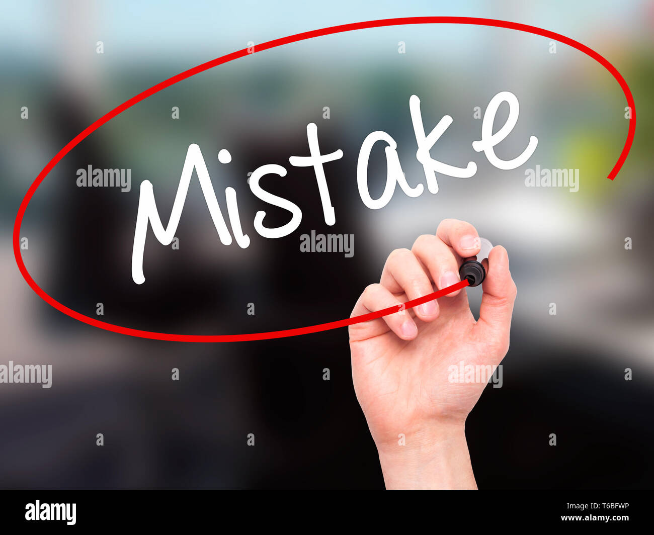 Man Hand writing Mistake with black marker on visual screen Stock Photo ...