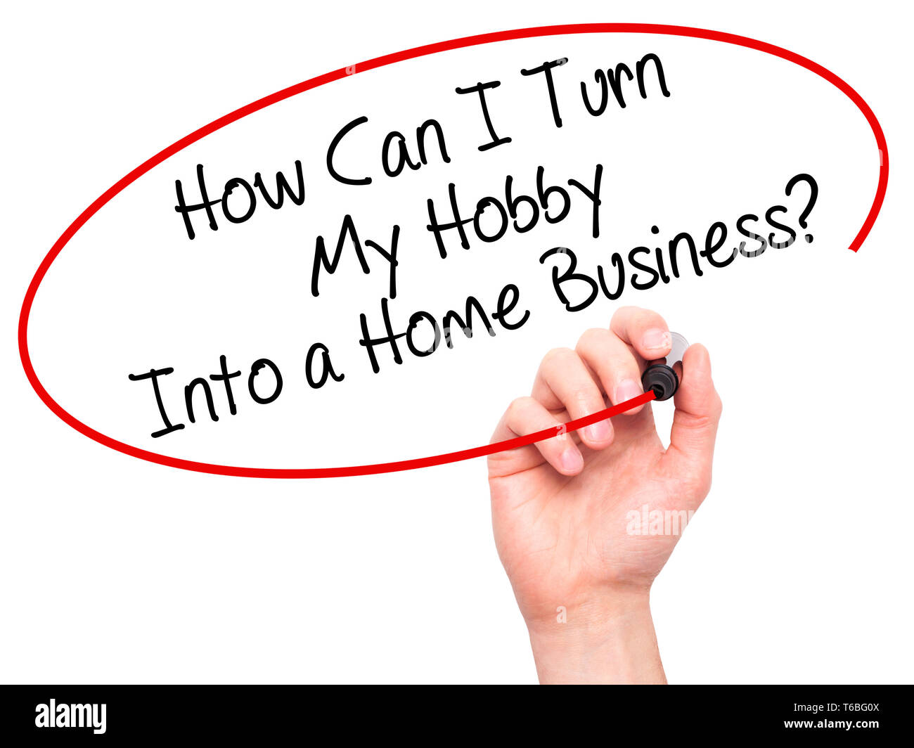 Man Hand writing How Can I Turn My Hobby Into a Home Business? with ...