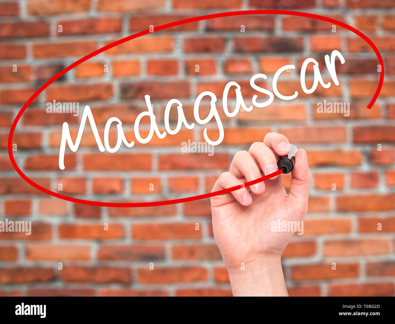 Man Hand writing Madagascar with black marker on visual screen Stock ...