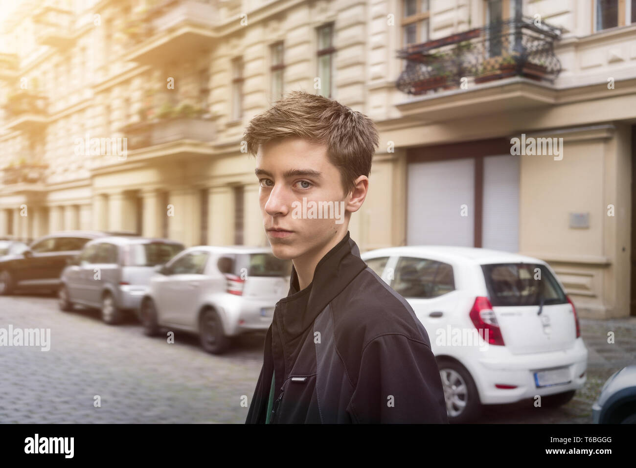 portrait of a young man on the street Stock Photo - Alamy