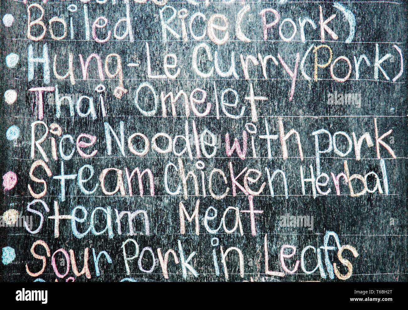 Menu food are hand written of chalk on blackboard Stock Photo - Alamy