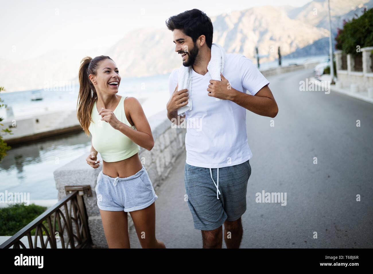 Female jogging happy hi-res stock photography and images - Alamy