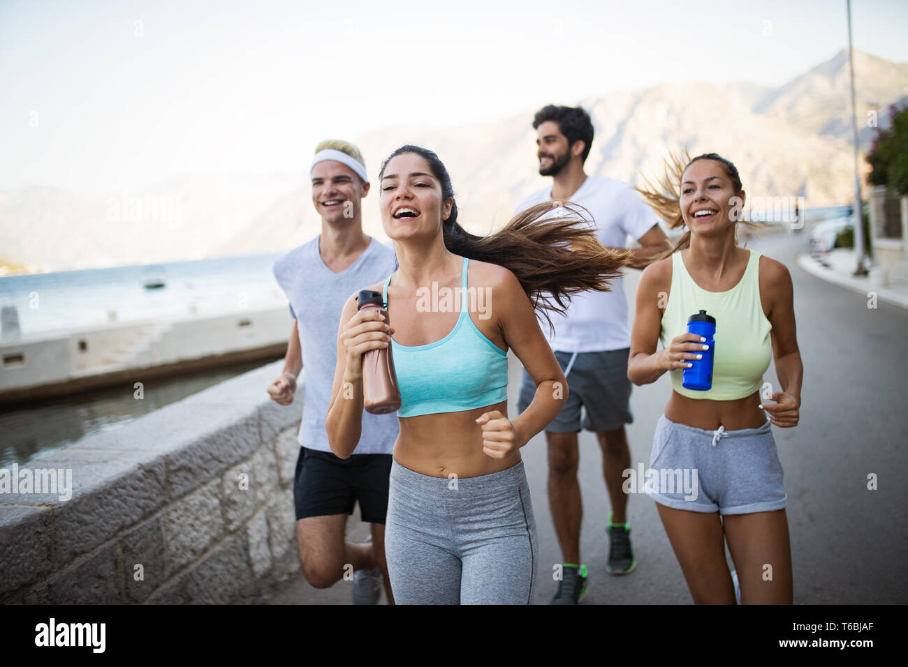 Group fit athletes jogging hi-res stock photography and images - Alamy