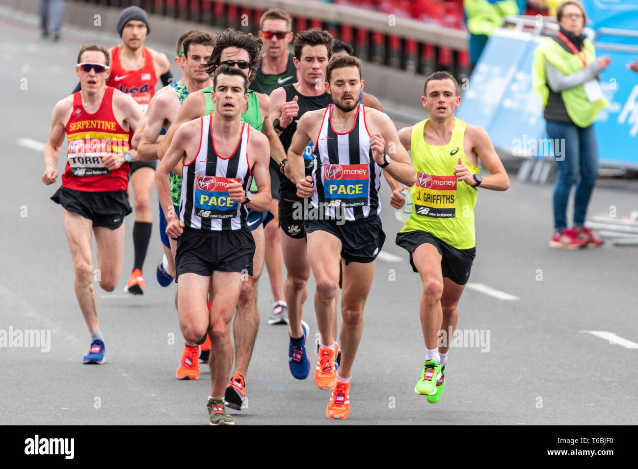 Joshua Griffiths running with pace makers racing at the Virgin Money ...