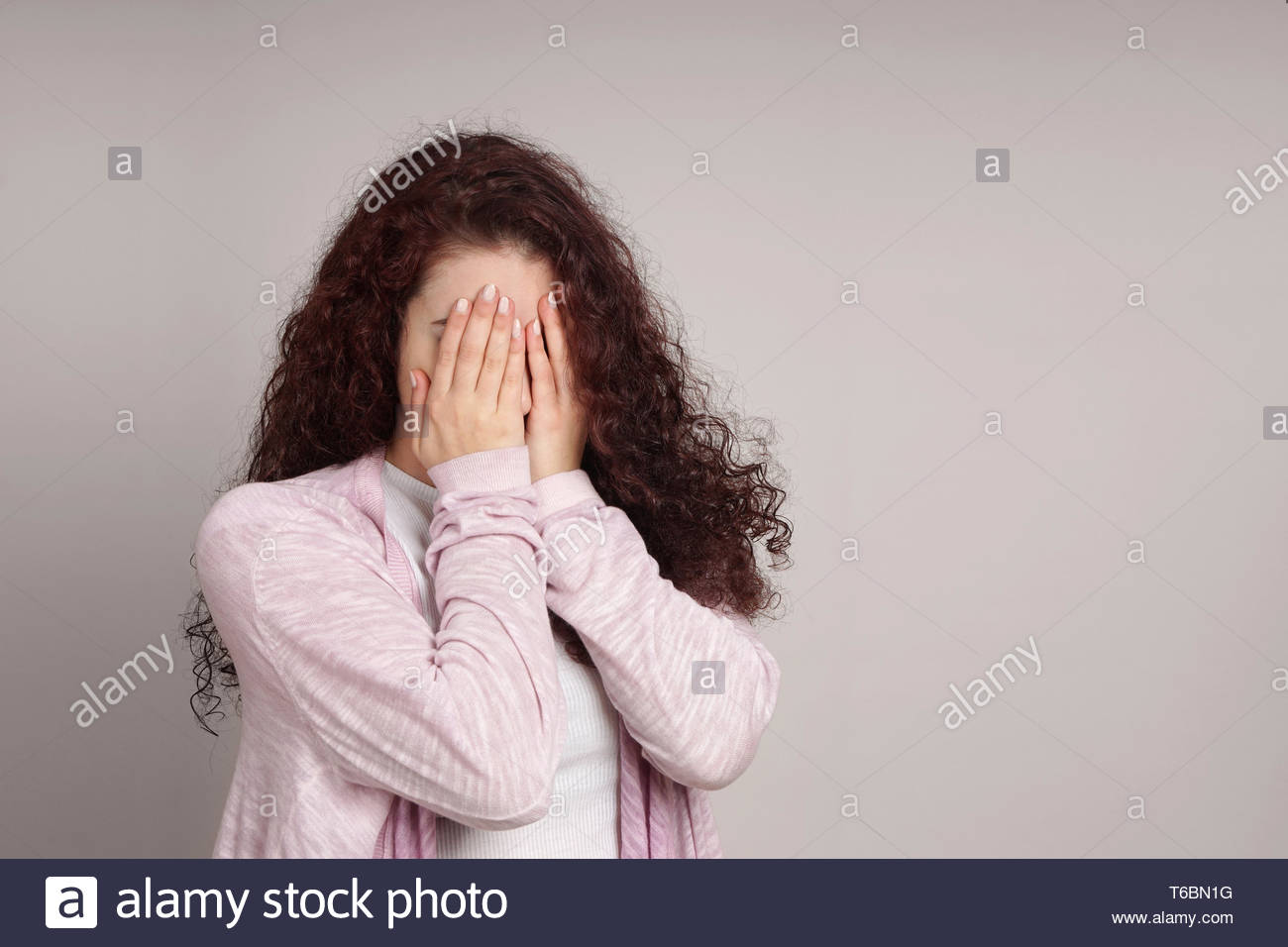 Shy Embarrassed Young Woman High Resolution Stock Photography and ...
