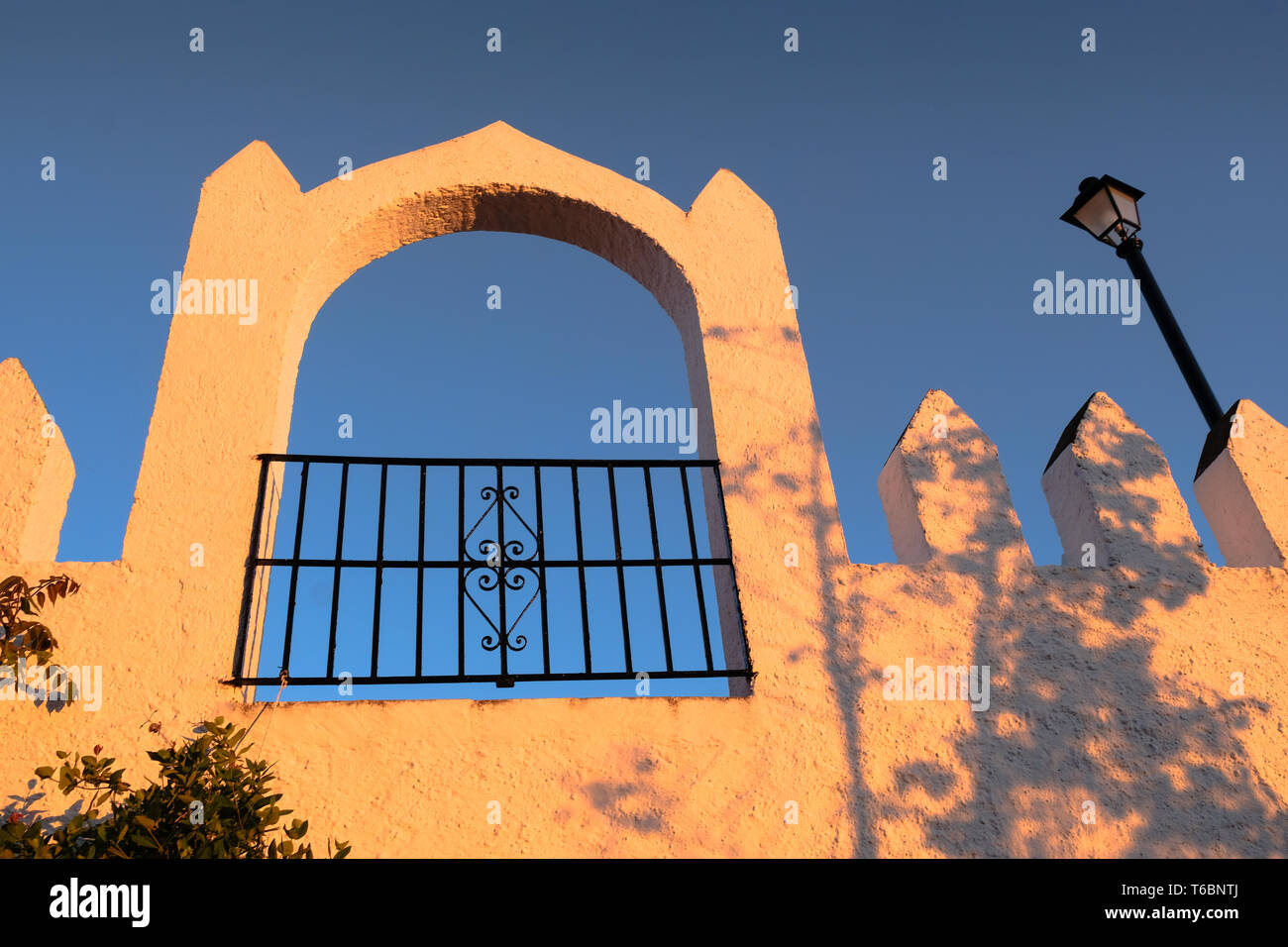 Evening light on the Moorish architecture of Castillo de Comares ...
