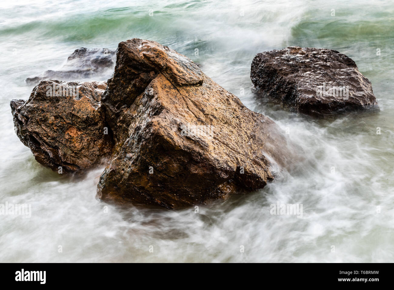 Waves beaches hi-res stock photography and images - Alamy