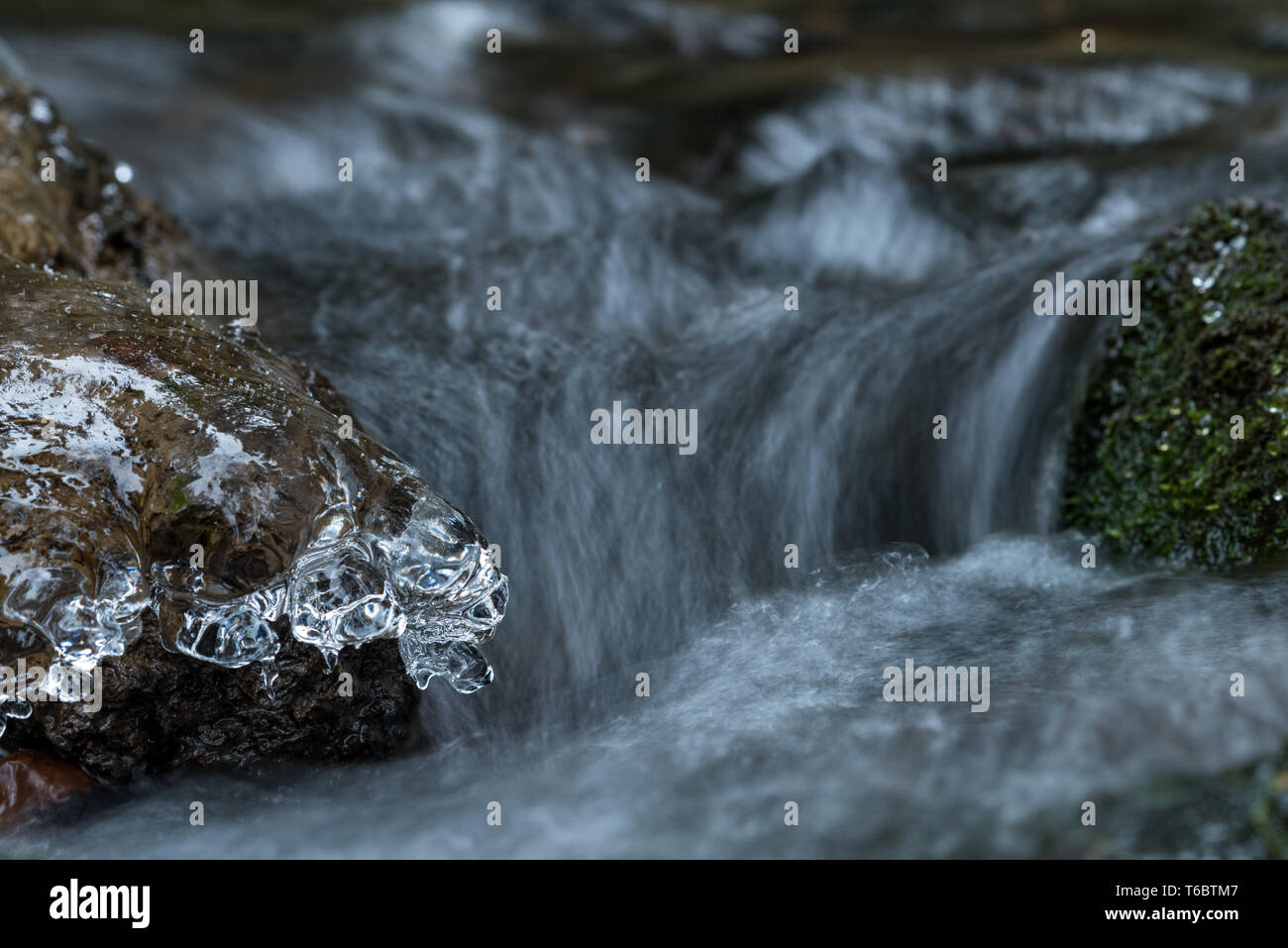Frozen German stream Stock Photo - Alamy