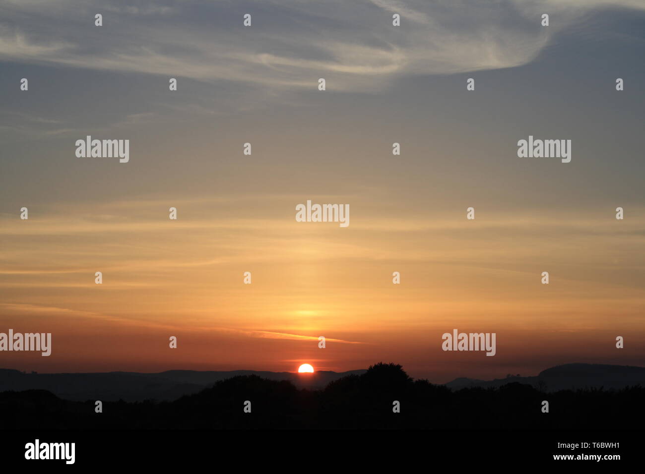 View countryside sunset over mountains hi-res stock photography and ...