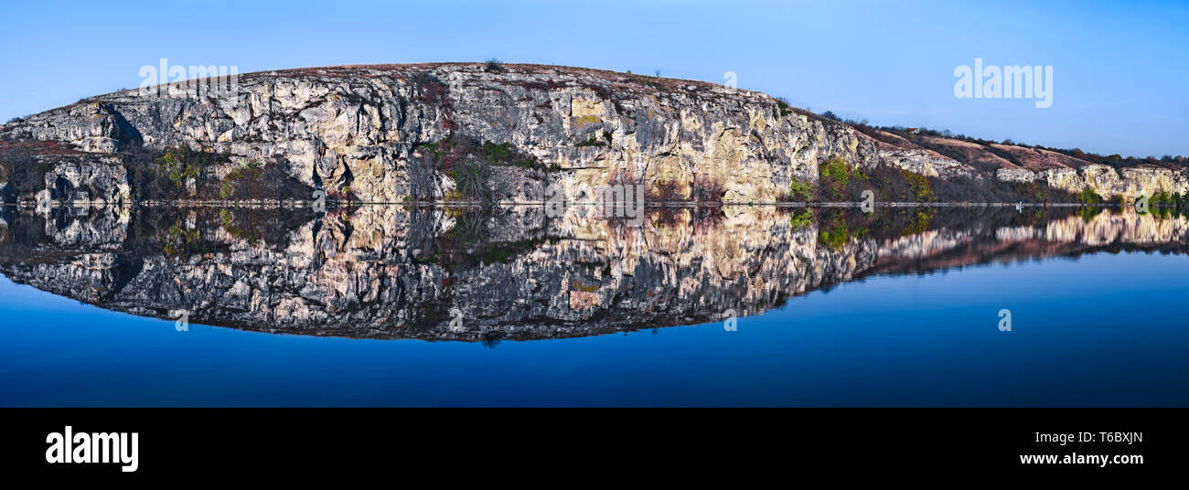 Perfect mirror reflection on lake Stock Photo - Alamy