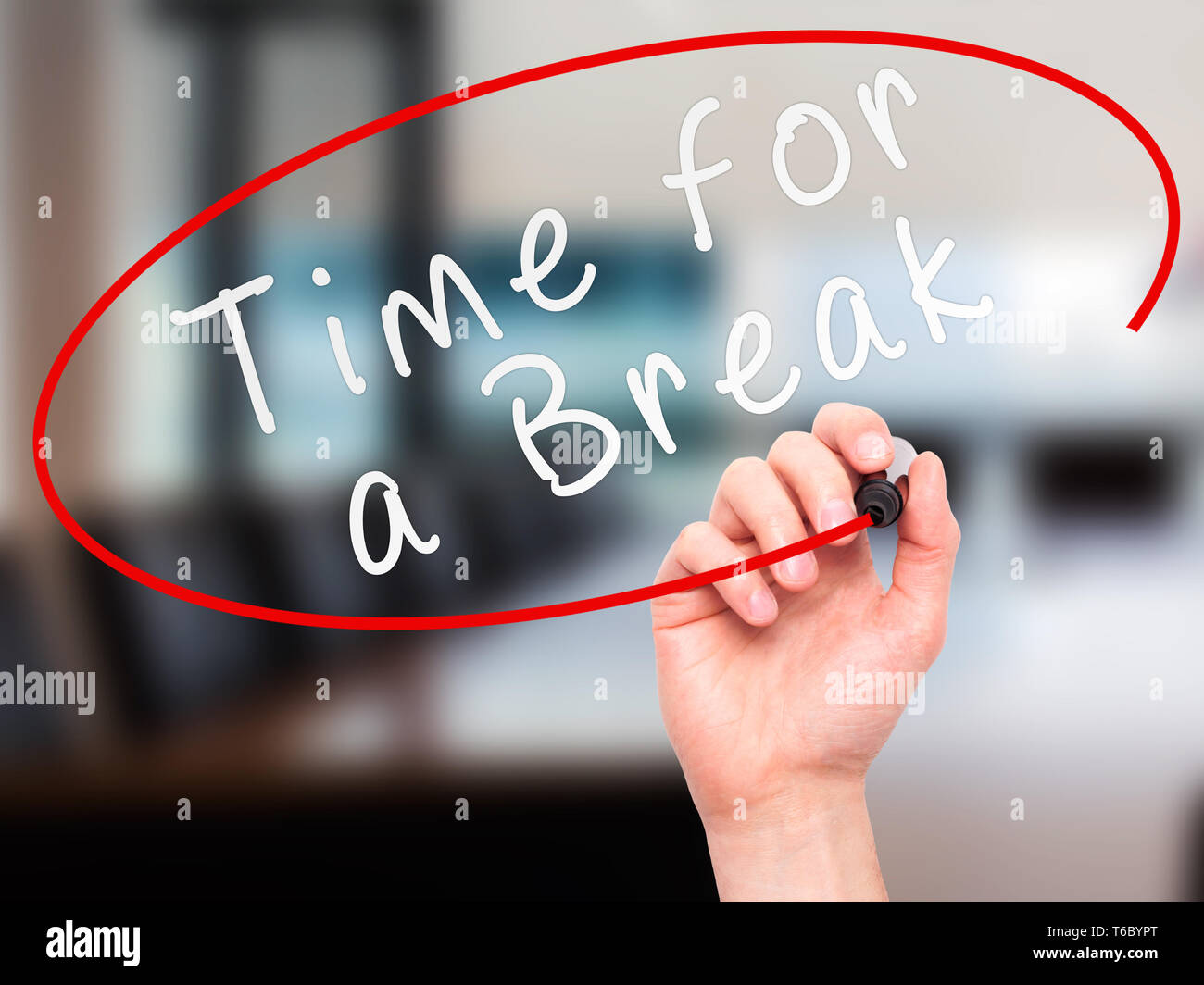 Man Hand writing Time for a Break with marker on transparent wipe board ...