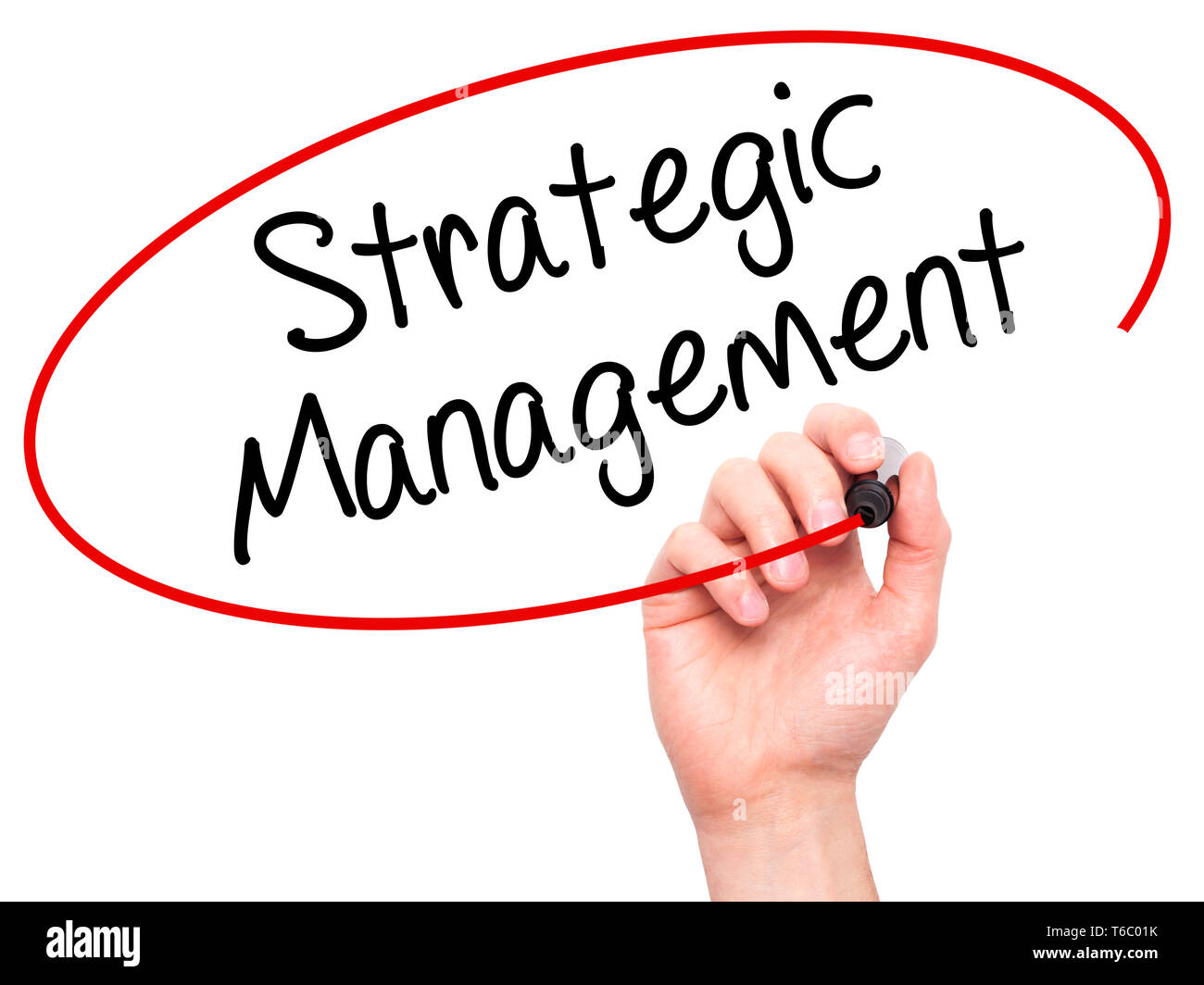 Man Hand writing Strategic Management with black marker on visual ...
