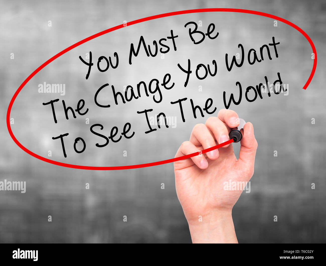 Man Hand writing You Must Be The Change You Want To See In The World ...