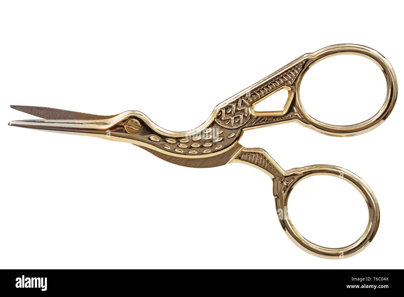 Scissors with curly handles in the shape of a bird, with clipping path ...