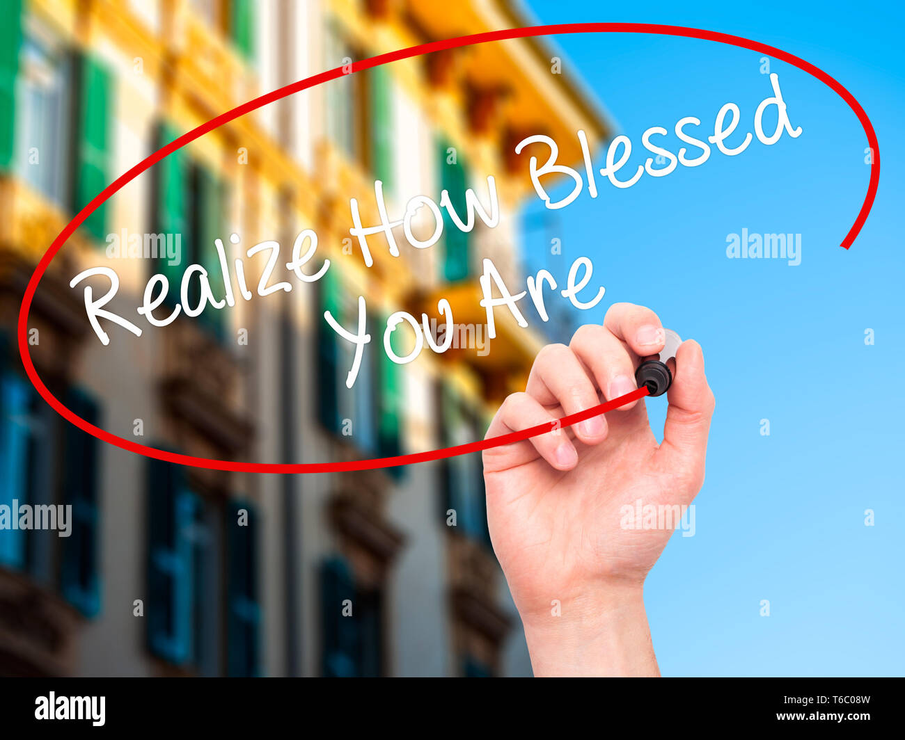 Man Hand writing Realize How Blessed You Are with black marker on ...