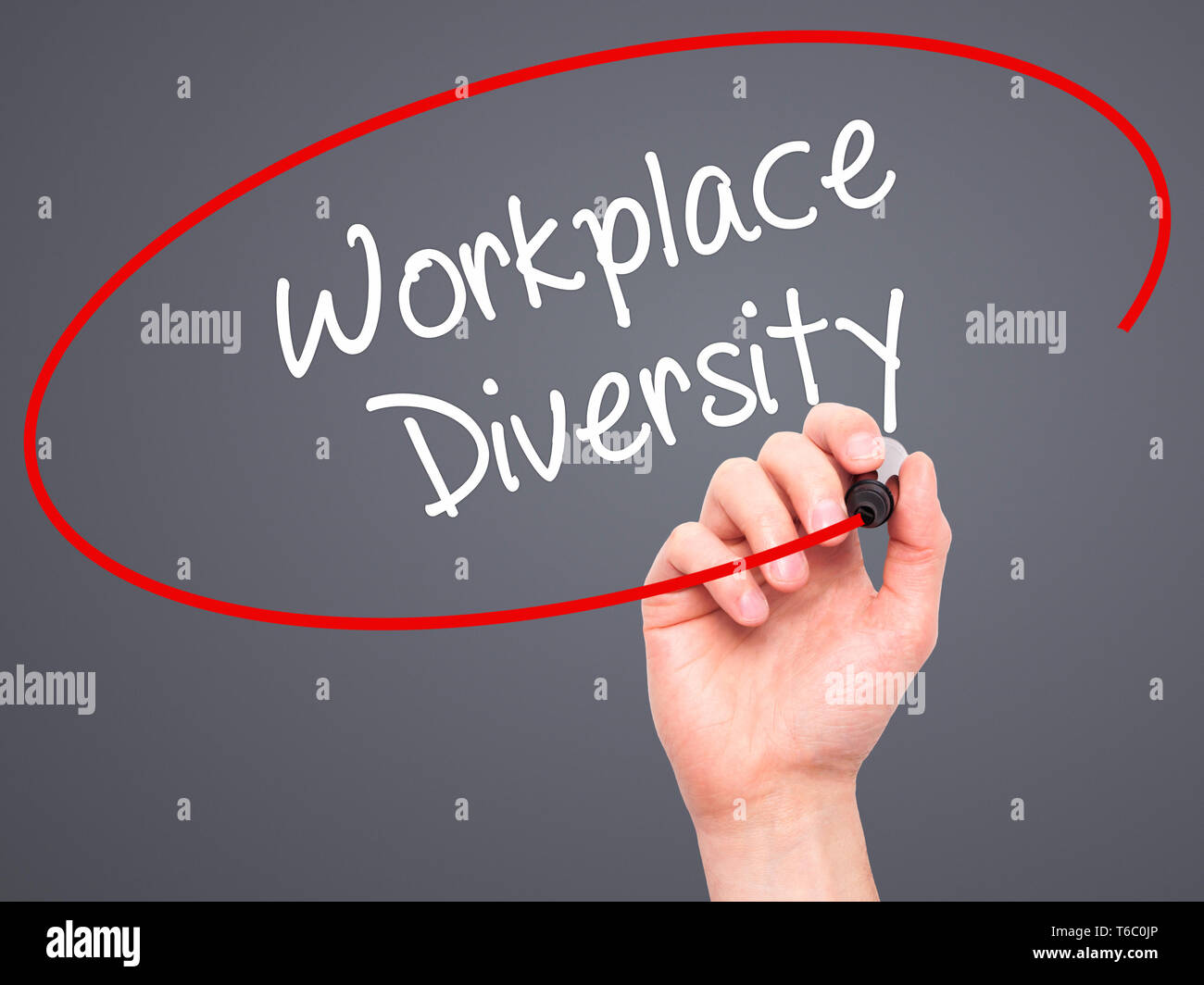 Man Hand writing Workplace Diversity with black marker on visual screen ...