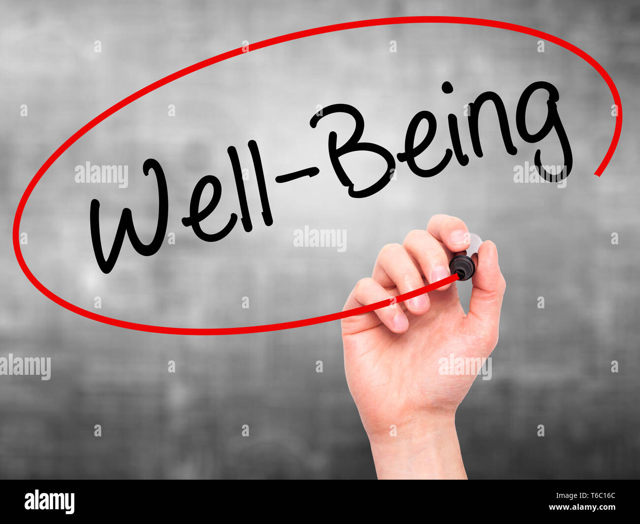 Man Hand writing Well-Being with black marker on visual screen Stock ...