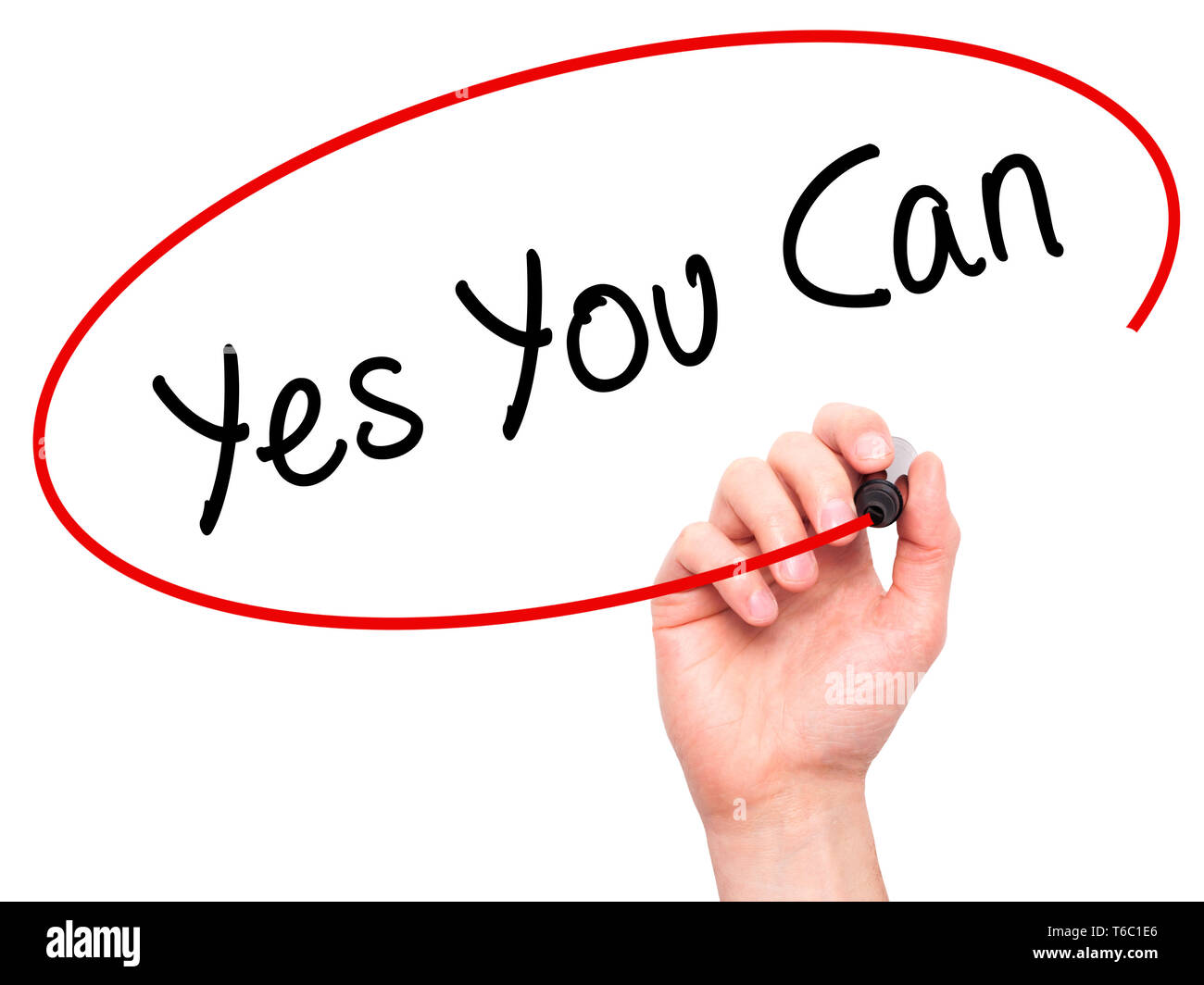 Man Hand writing Yes You Can with marker on transparent wipe board ...