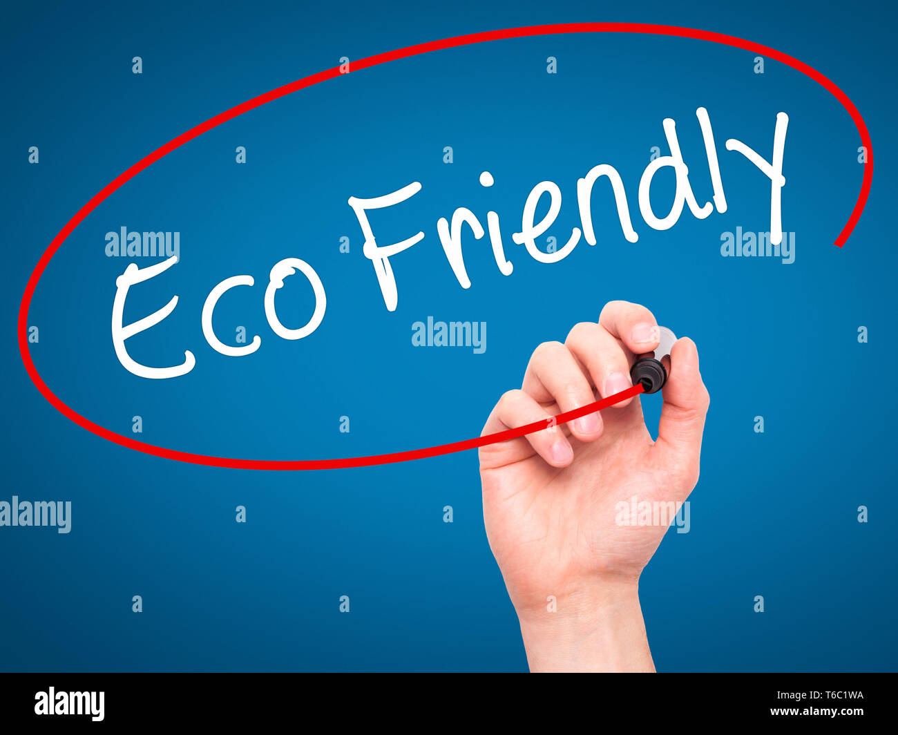 Man Hand writing Eco Friendly with black marker on visual screen Stock ...