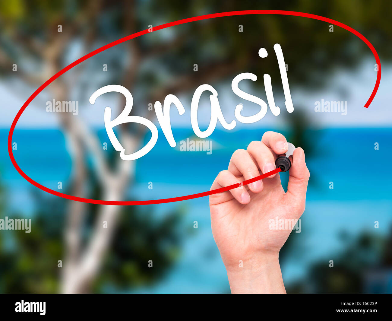 Man Hand writing Brasil ( Brazil in Portuguese) with black marker on ...