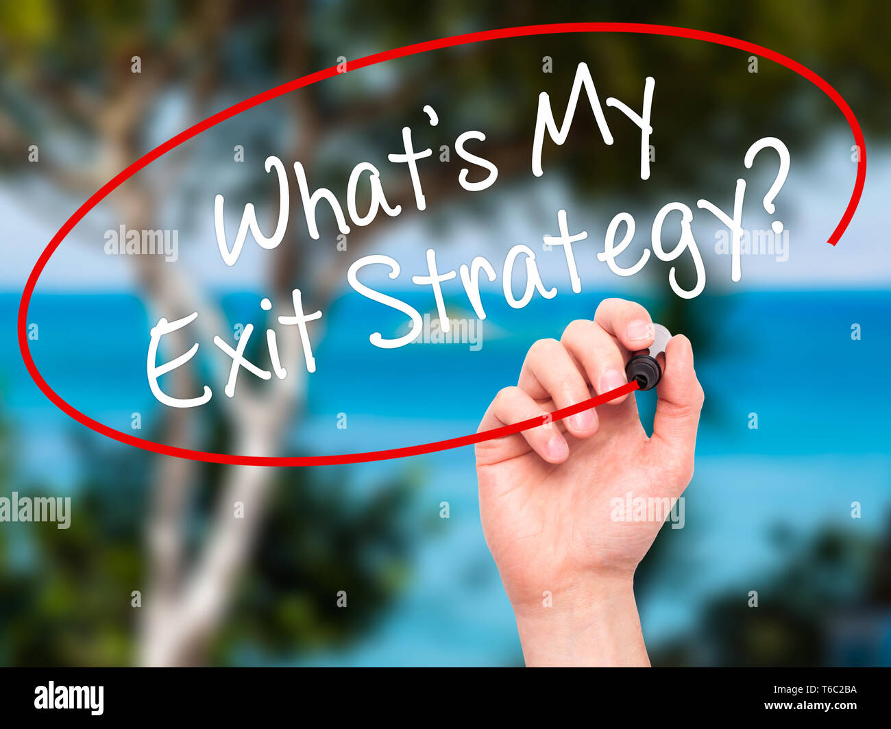 Man Hand writing What's My Exit Strategy? with black marker on visual ...