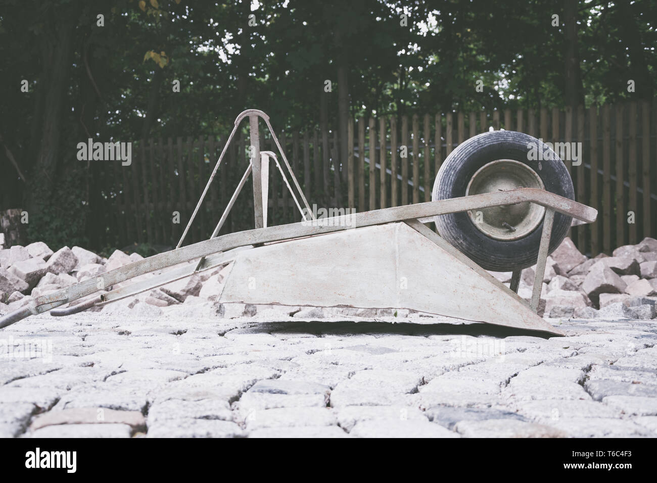 Broken wheelbarrow hi-res stock photography and images - Alamy