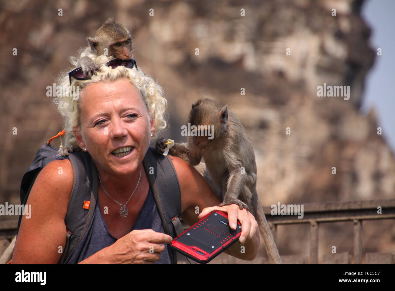 Woman and monkey attack hi-res stock photography and images - Alamy