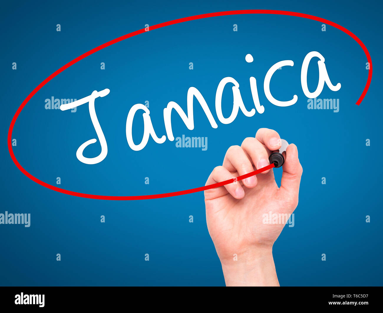 Man Hand writing Jamaica with black marker on visual screen Stock Photo ...