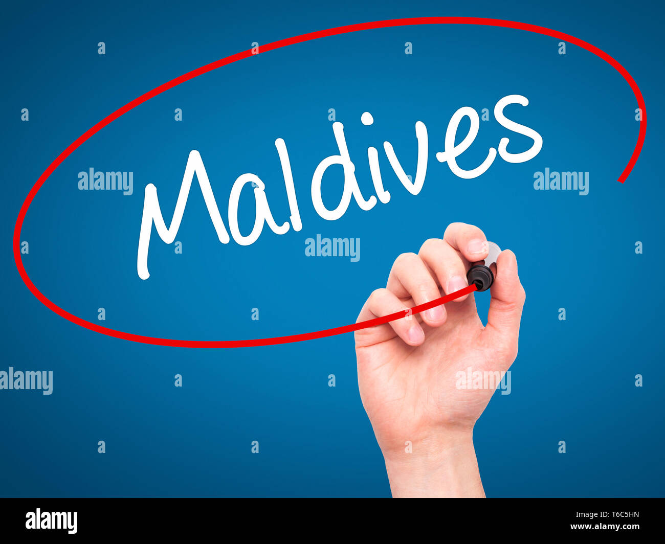Man Hand writing Maldives with black marker on visual screen Stock ...