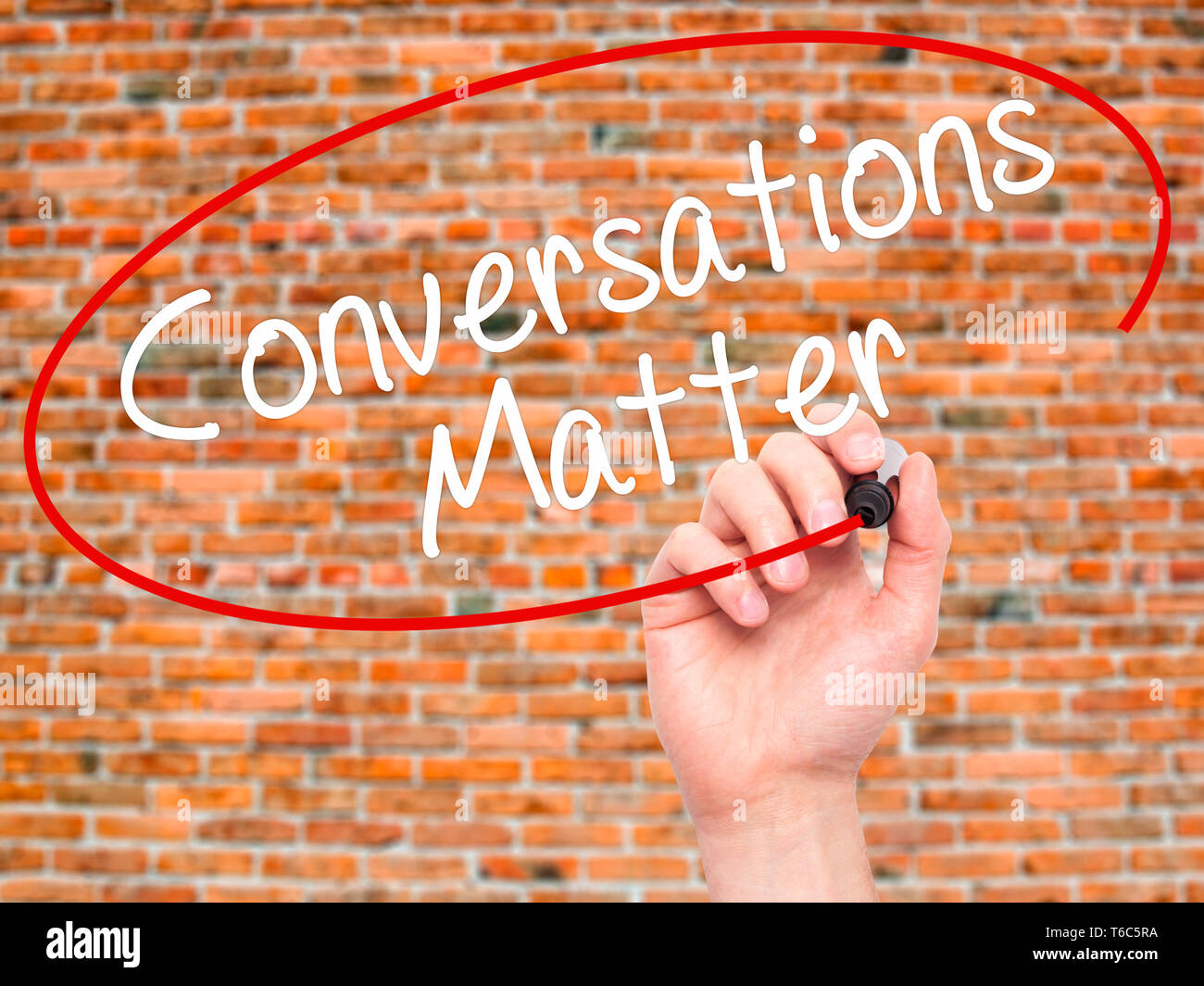 Man Hand writing Conversations Matter with black marker on visual ...
