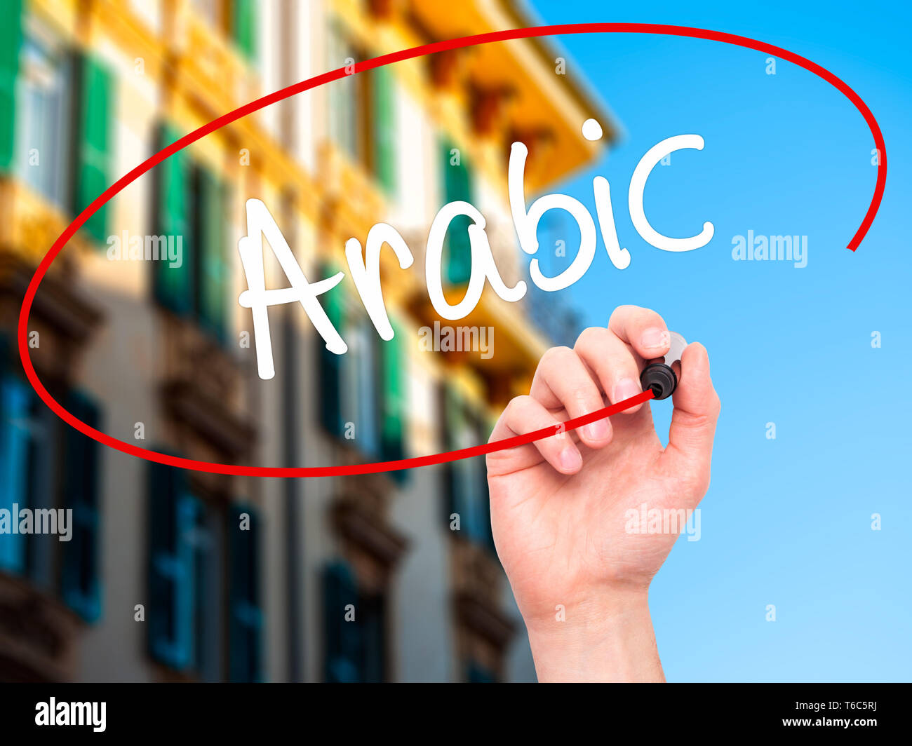 Man Hand writing Arabic with black marker on visual screen Stock Photo ...