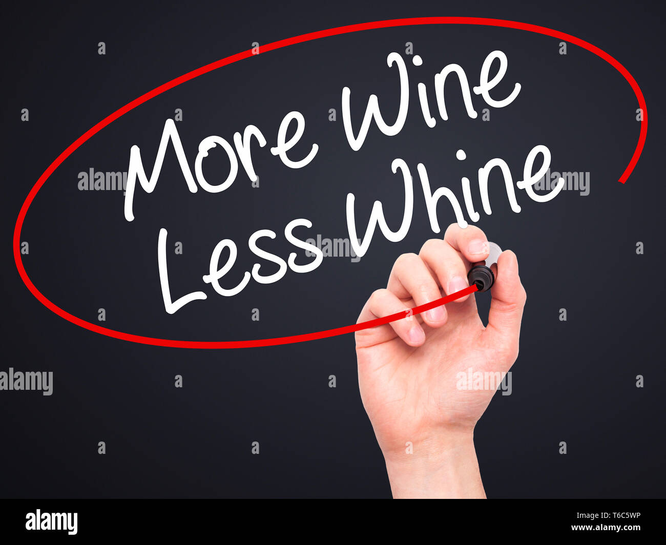 Man Hand writing More Wine Less Whine with black marker on visual ...